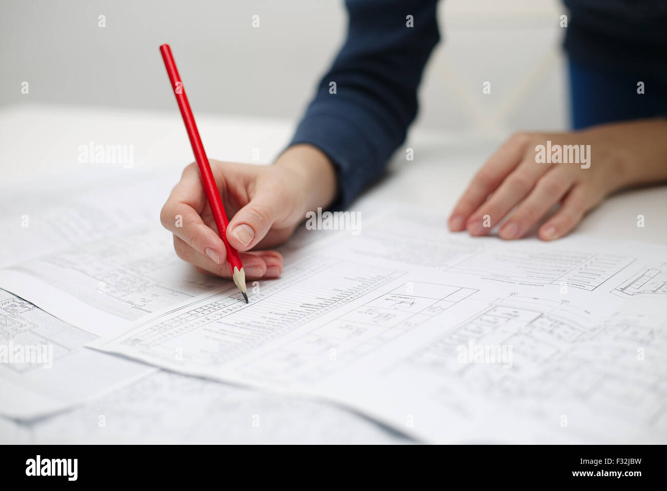 Architect woman drawing construction project hi-res stock photography ...