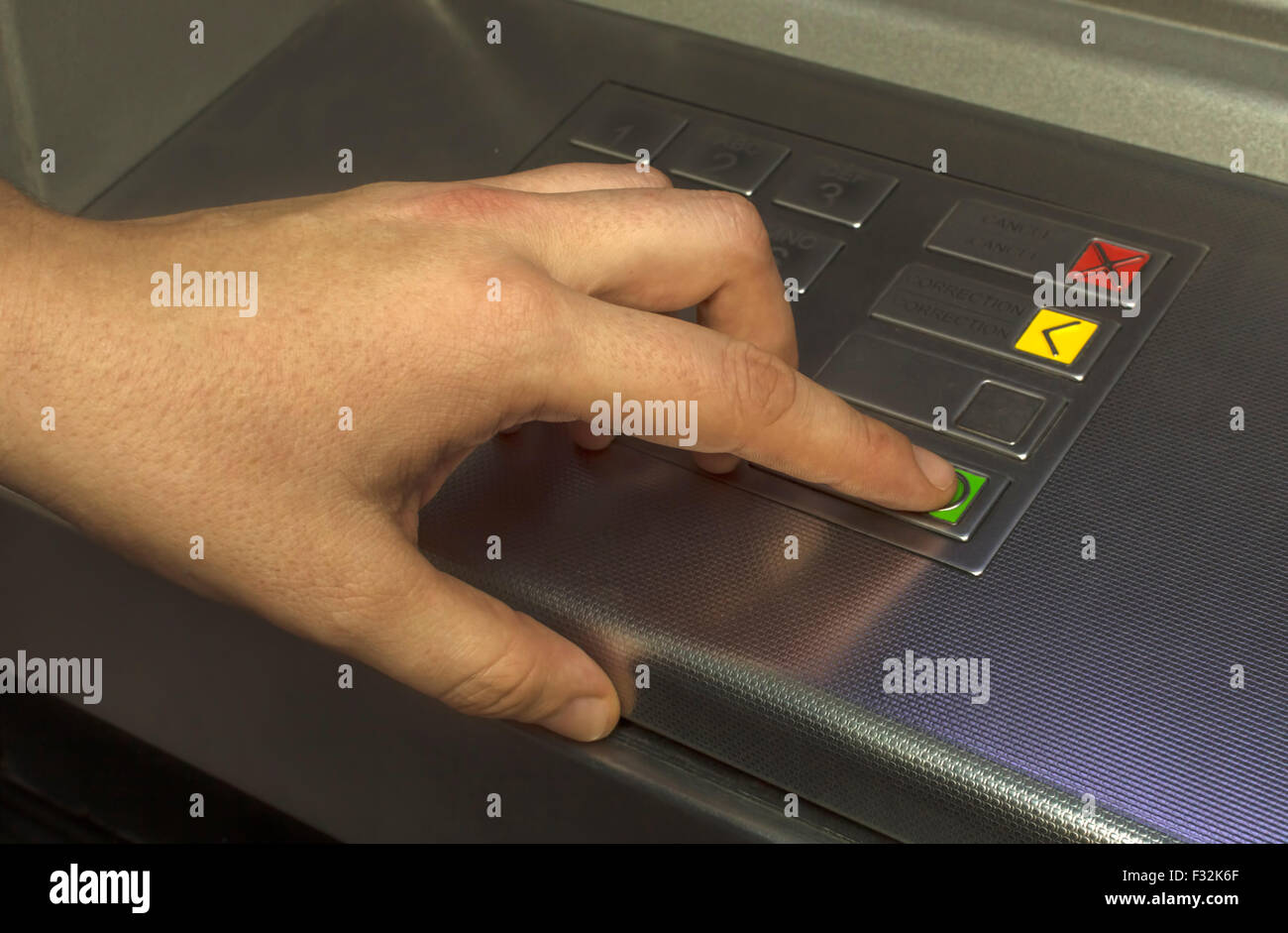 Human hand touching ATM machine. Selective focus Stock Photo - Alamy