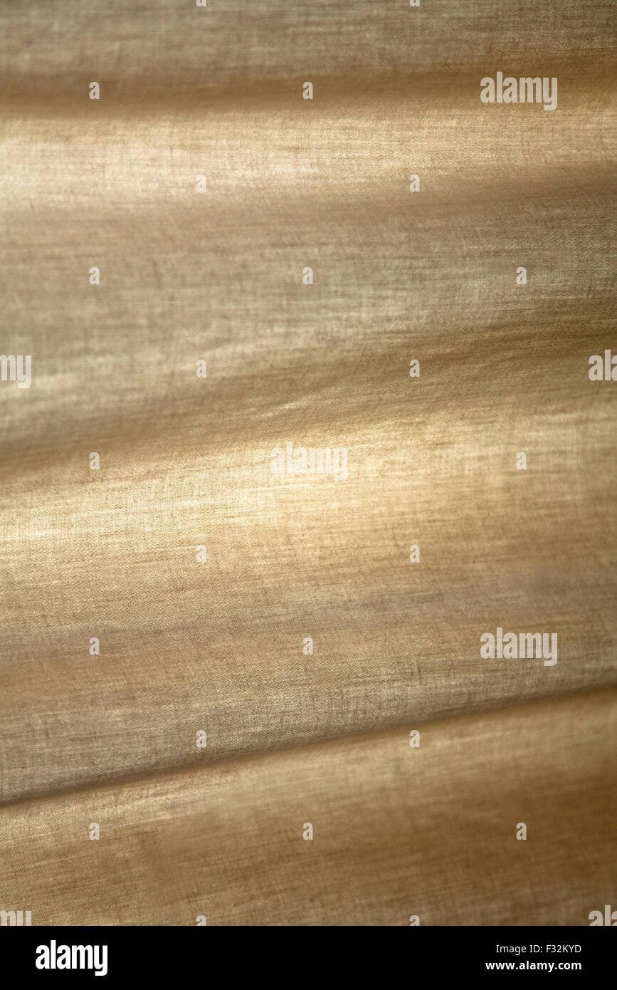 Light filtering through cream material Stock Photo - Alamy