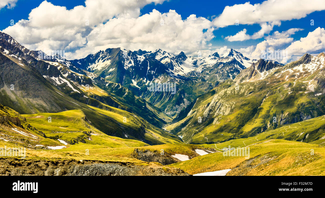 Landscape in French Alps with a view of a valley and mountain ranges ...