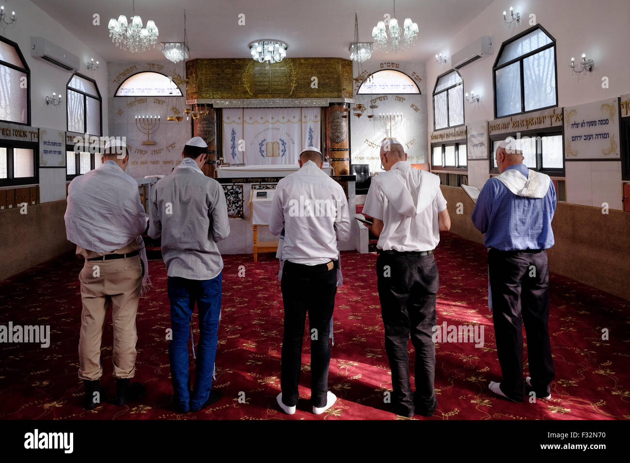 Karaite Jews bowing on the knees and prostrate during prayer in a ...