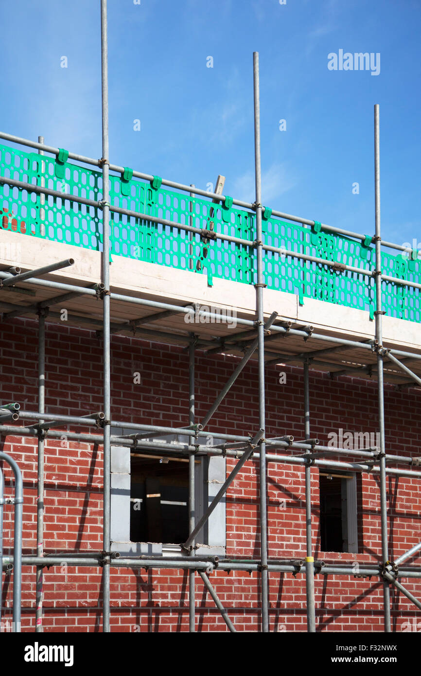 House building, builders security scaffolding netting in Chorley, by ...
