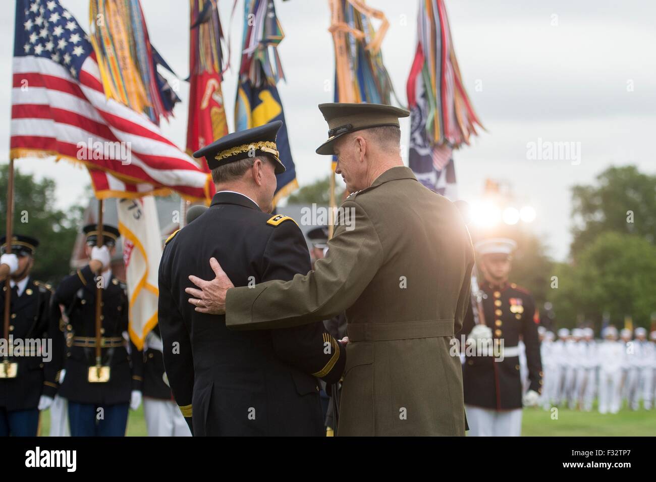 Outgoing Chairman of the Joint Chiefs Gen. Martin Dempsey (left) is ...