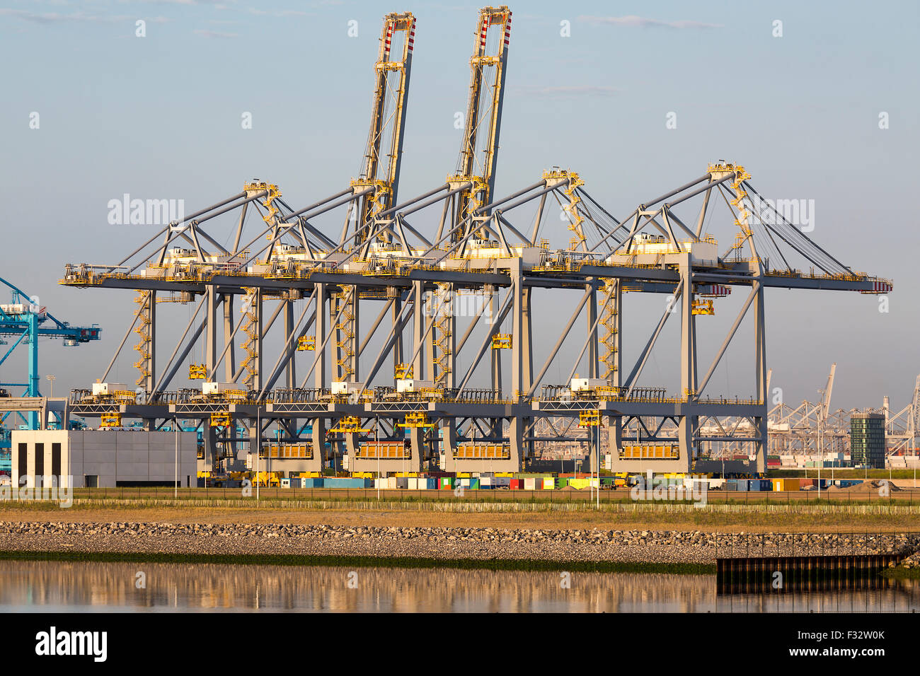 Container terminal in harbour at twilight Stock Photo - Alamy