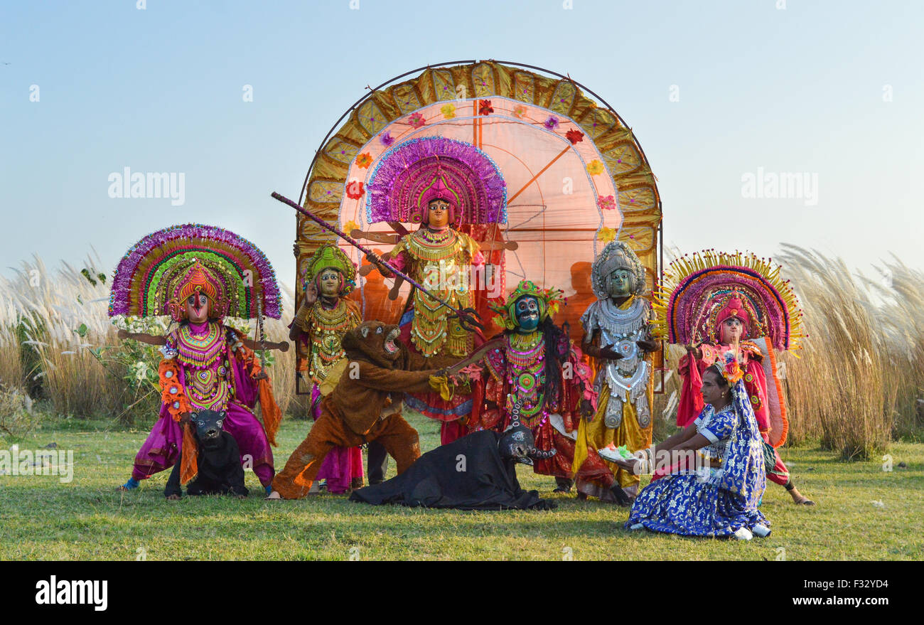 Indian traditional Chhau dancers perform a mythological act during ...