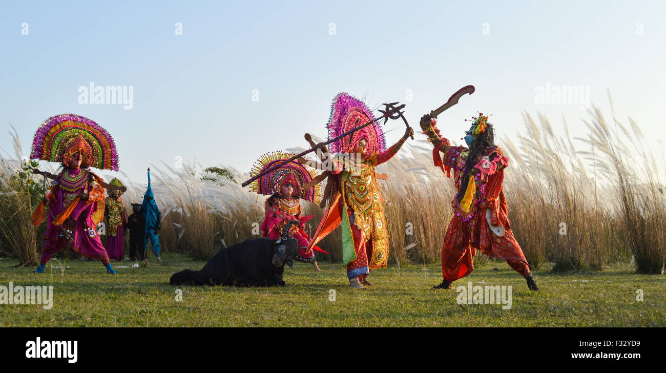 Indian traditional Chhau dancers perform a mythological act during ...