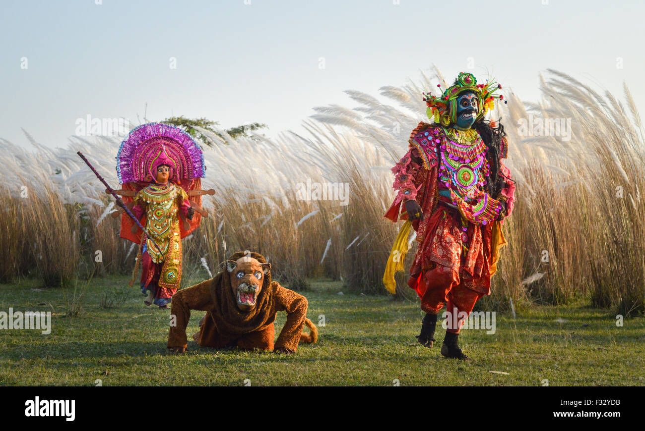 Indian traditional Chhau dancers perform a mythological act during ...