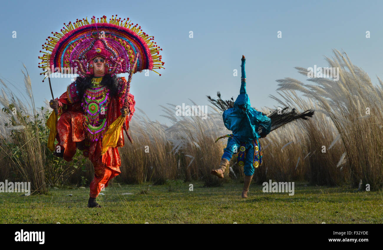 Indian traditional Chhau dancers perform a mythological act during ...