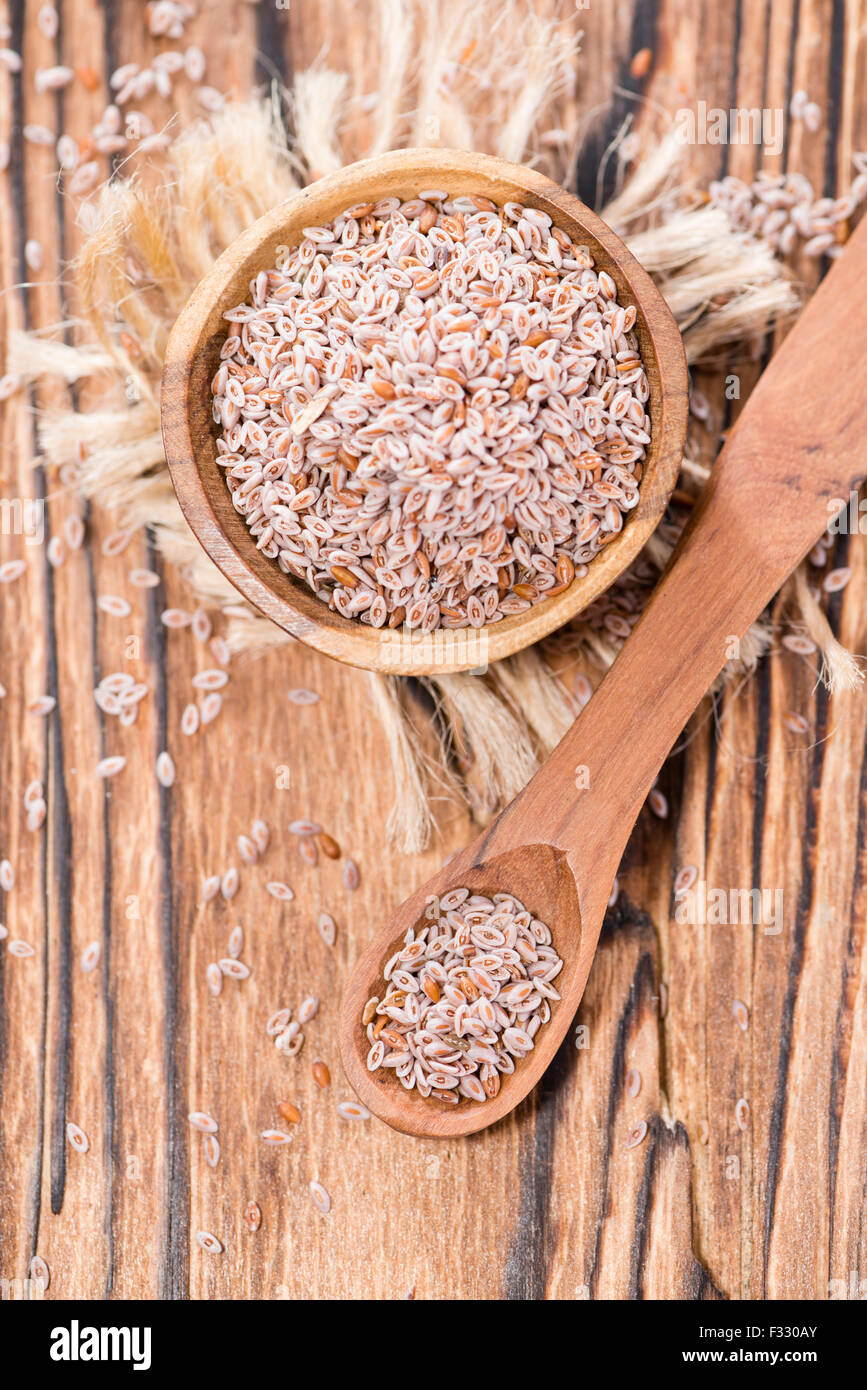 Portion of Psyllium Seeds on rustic wooden background Stock Photo - Alamy