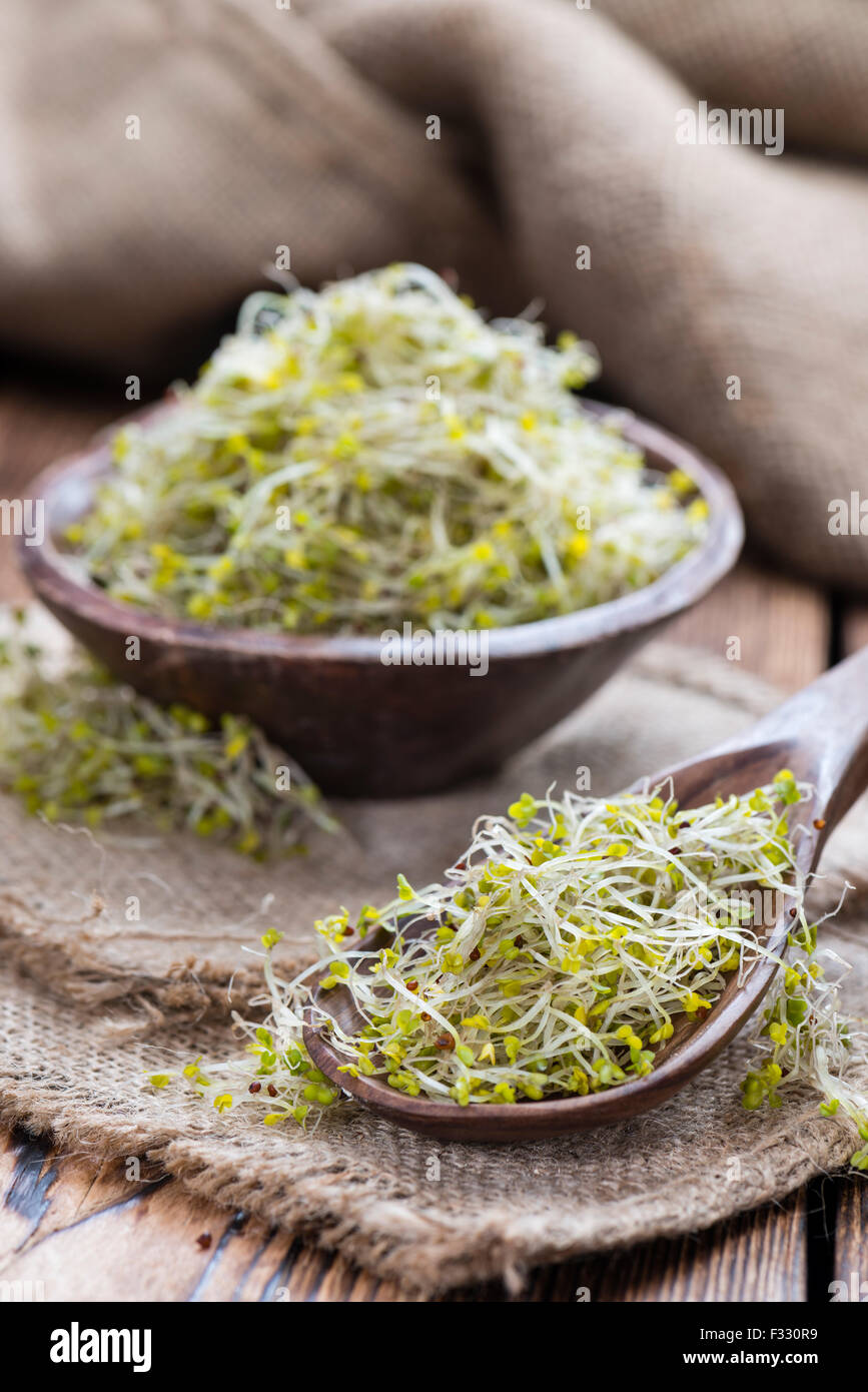 Fresh Broccoli Sprouts (detailed close-up shot) on vintage wooden ...