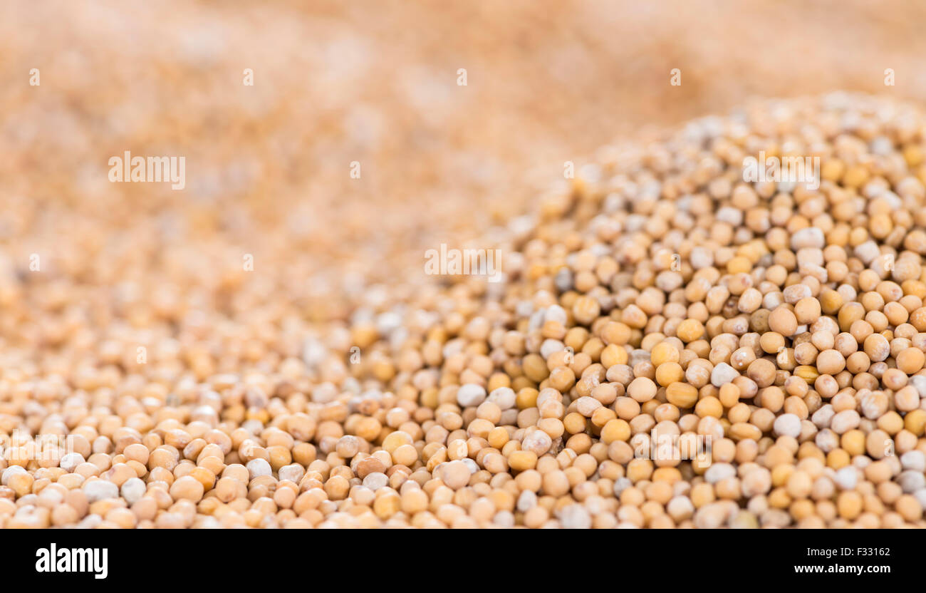 Portion of Mustard Seeds for background or texture use Stock Photo - Alamy