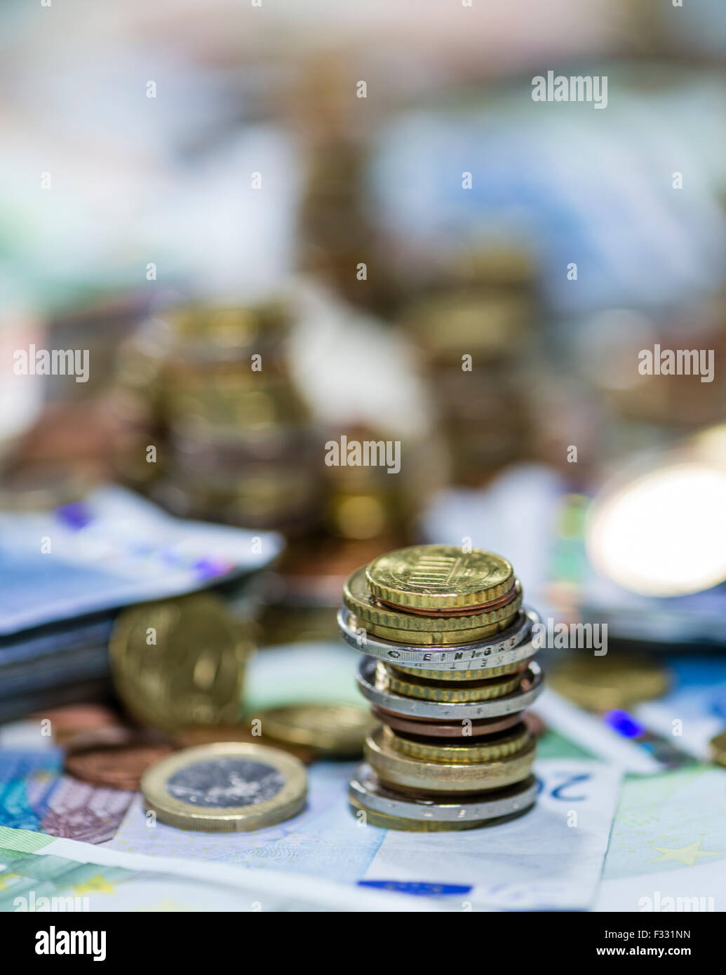 European Currency stacked Coins on Banknotes (close-up shot Stock Photo ...