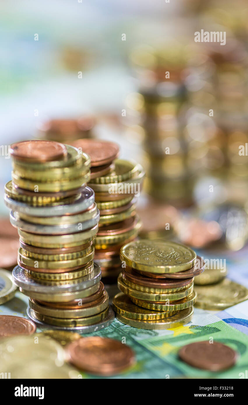 European Currency stacked Coins on Banknotes (close-up shot Stock Photo ...