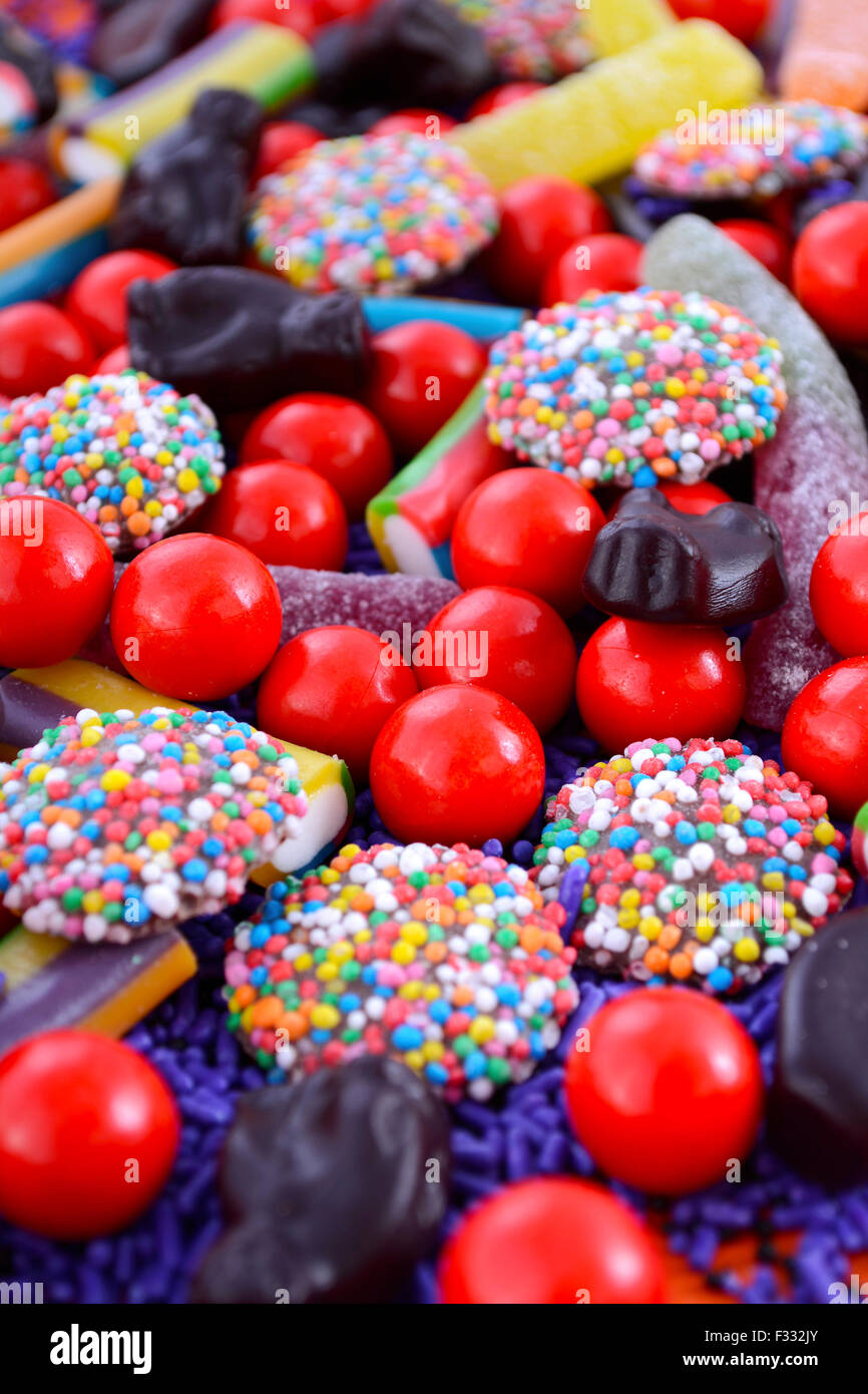 Bright colorful Halloween theme candy background with chocolate ...