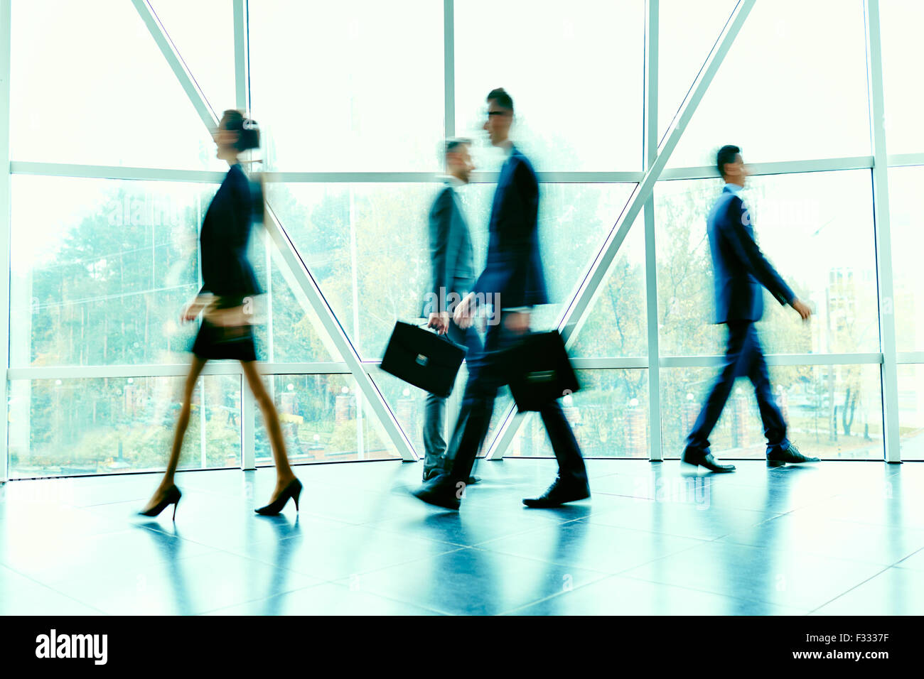 Hurrying into office building hi-res stock photography and images - Alamy