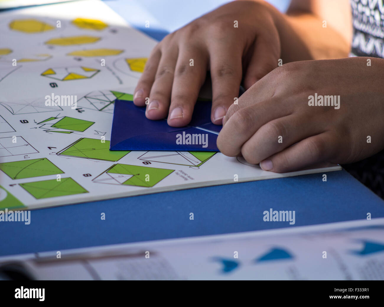 Teen origami hi-res stock photography and images - Alamy