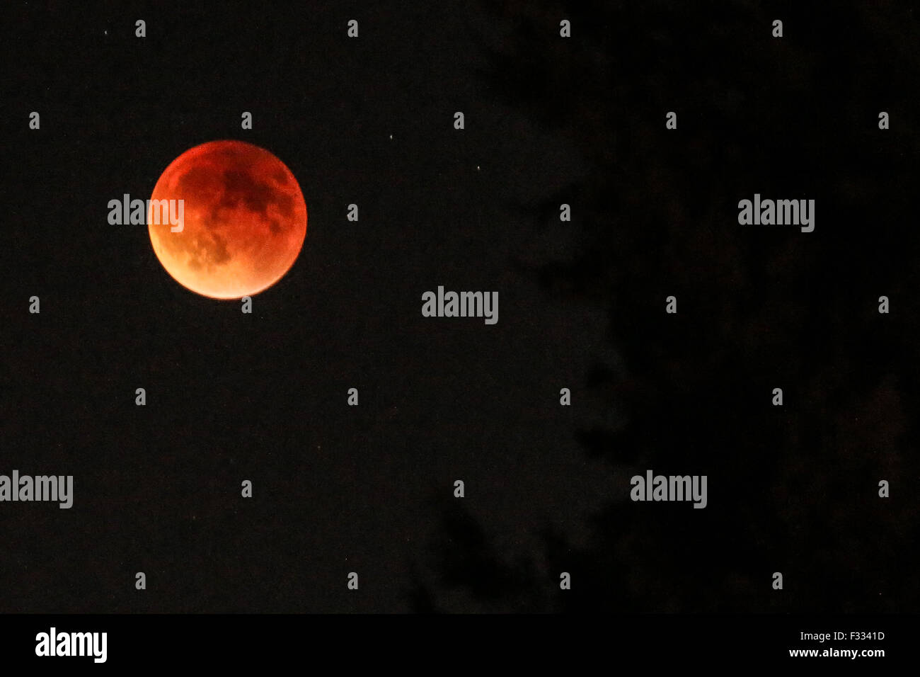Sept. 27, 2015 - The super blood moon eclipse as viewed from a hill top ...