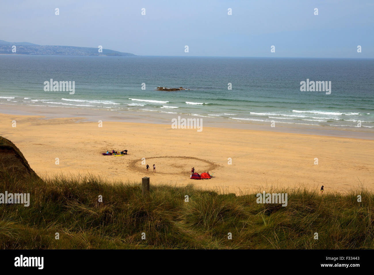 Rock stack beach at Gwithian Towans, Cornwall, United Kingdom Stock ...