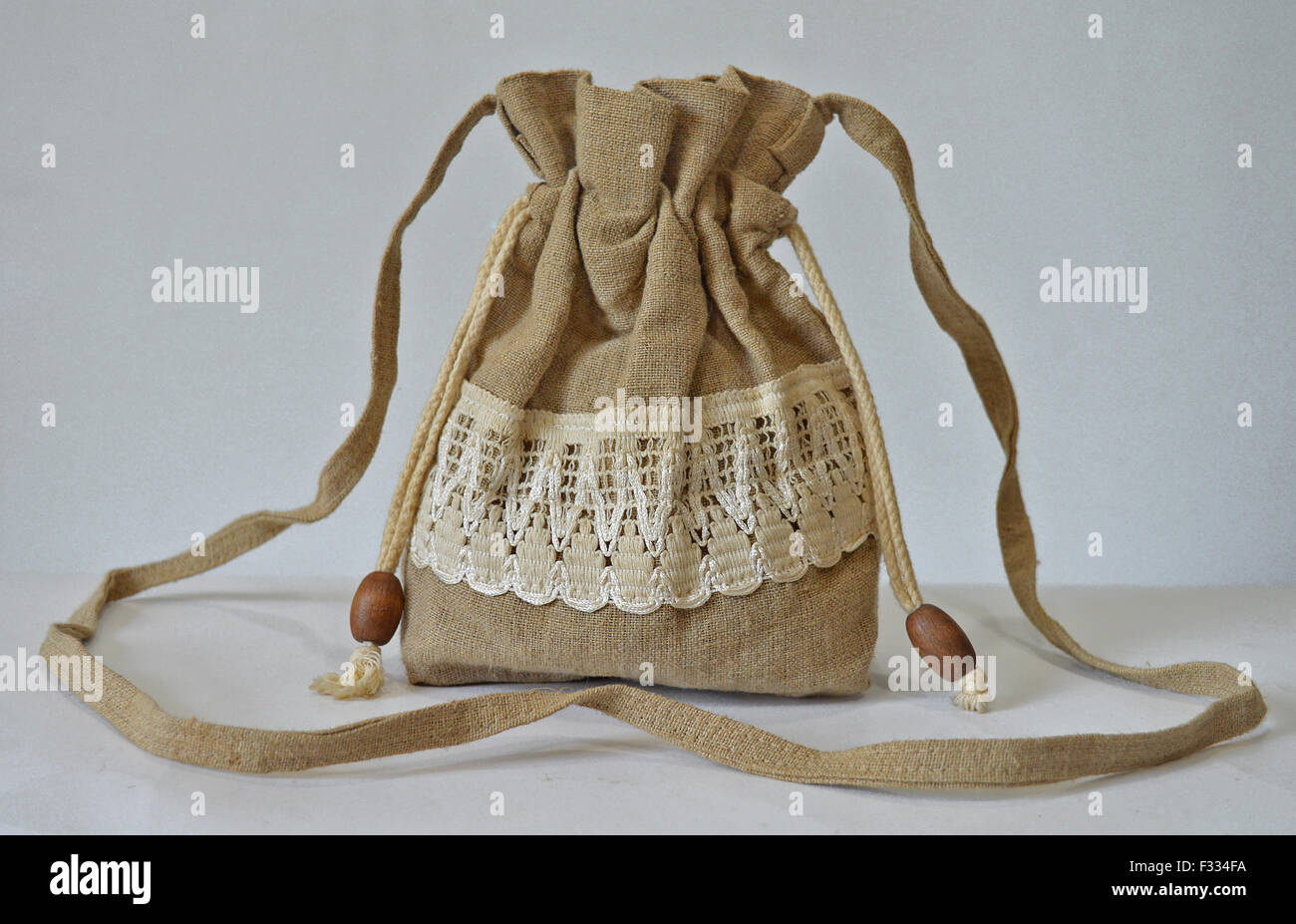 Retro handmade natural flax purse Stock Photo - Alamy