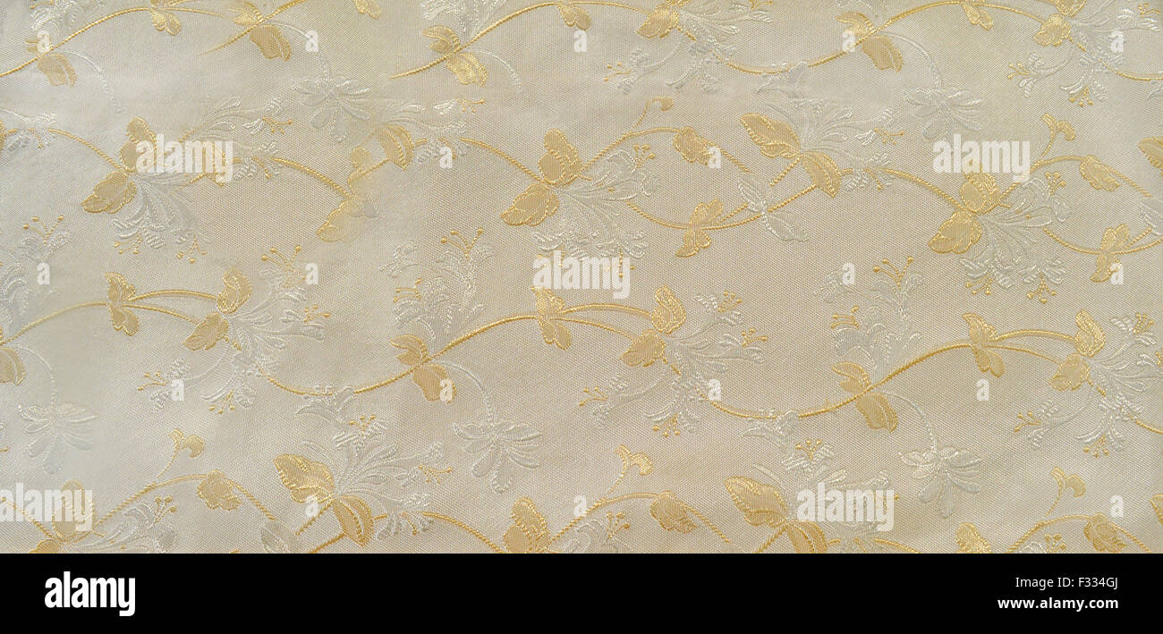 Vintage gold floral fabric Stock Photo - Alamy