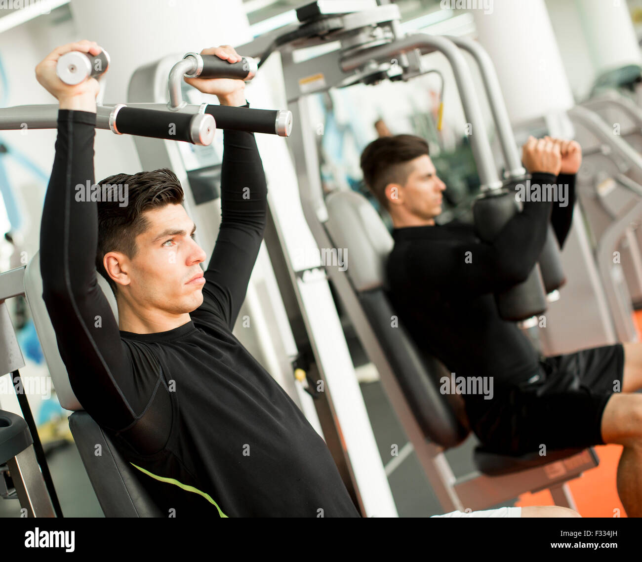 Young man in the gym Stock Photo - Alamy