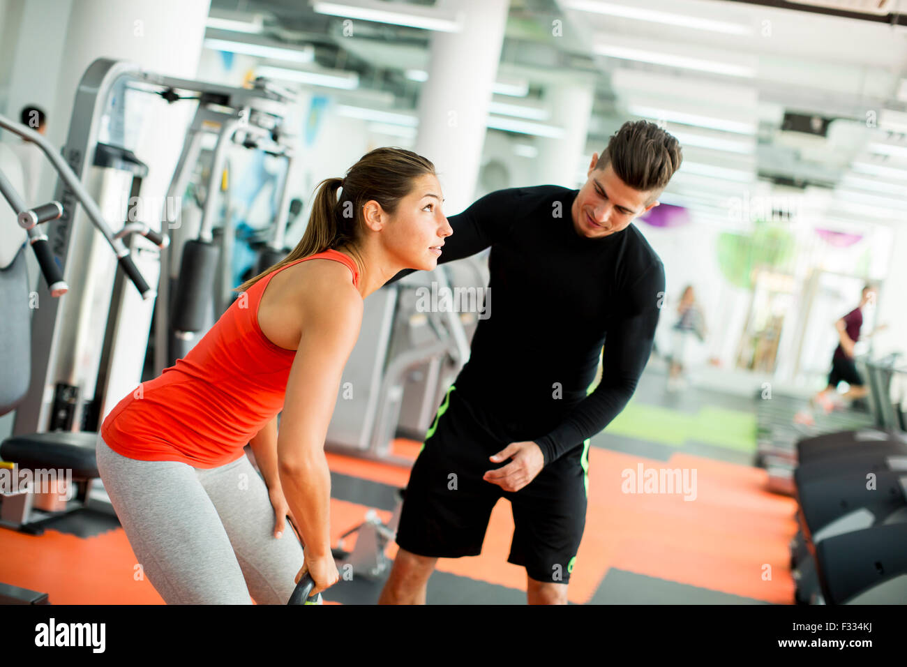 Young woman in the gym Stock Photo - Alamy