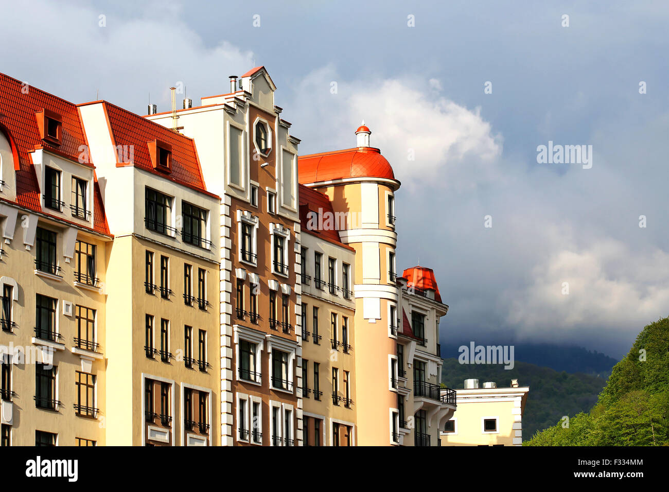 Facade of a massive building with turret, galleries and balconies Stock ...