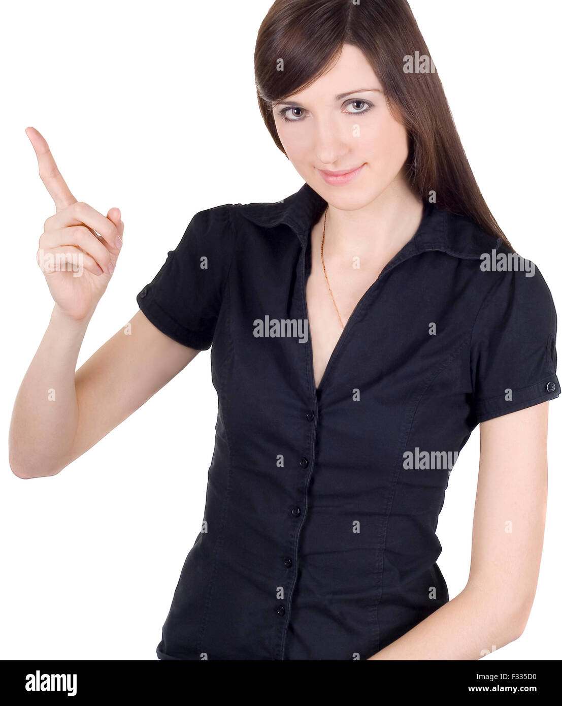 attractive young woman pointing her finger at copyspace Stock Photo - Alamy