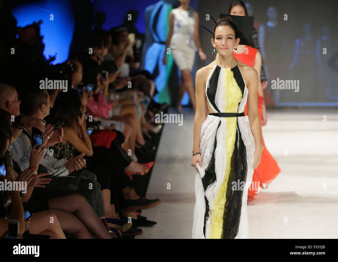 Vancouver, Canada. 28th Sep, 2015. Models present a creation of the ...