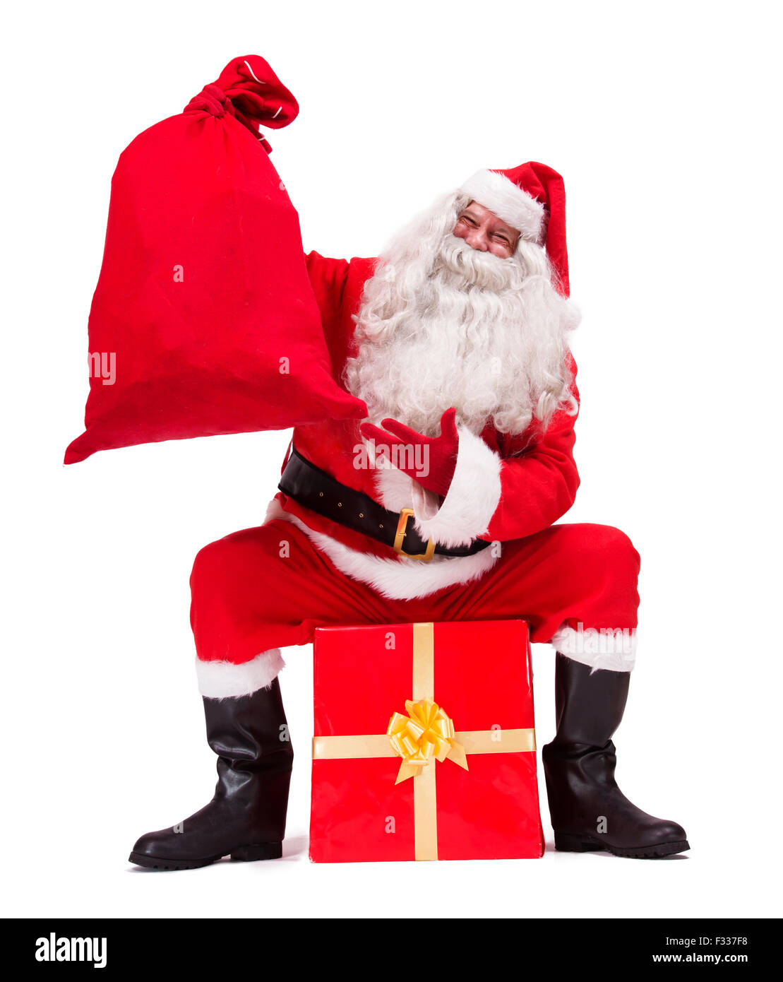 Santa claus giving gift hi-res stock photography and images - Alamy