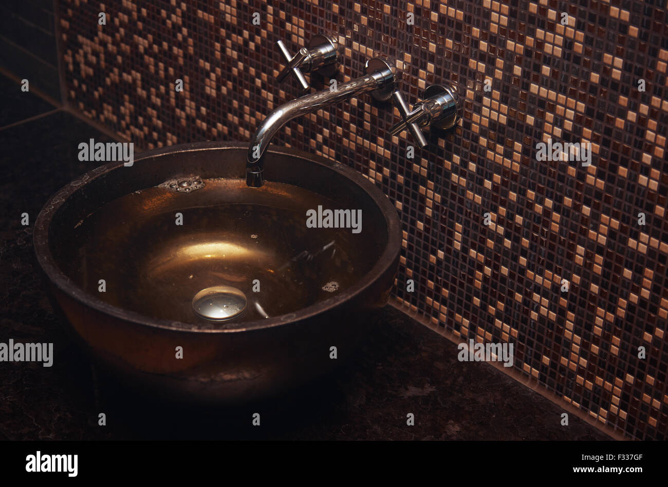 Sink and water tap. Horizontal close-up photo Stock Photo - Alamy