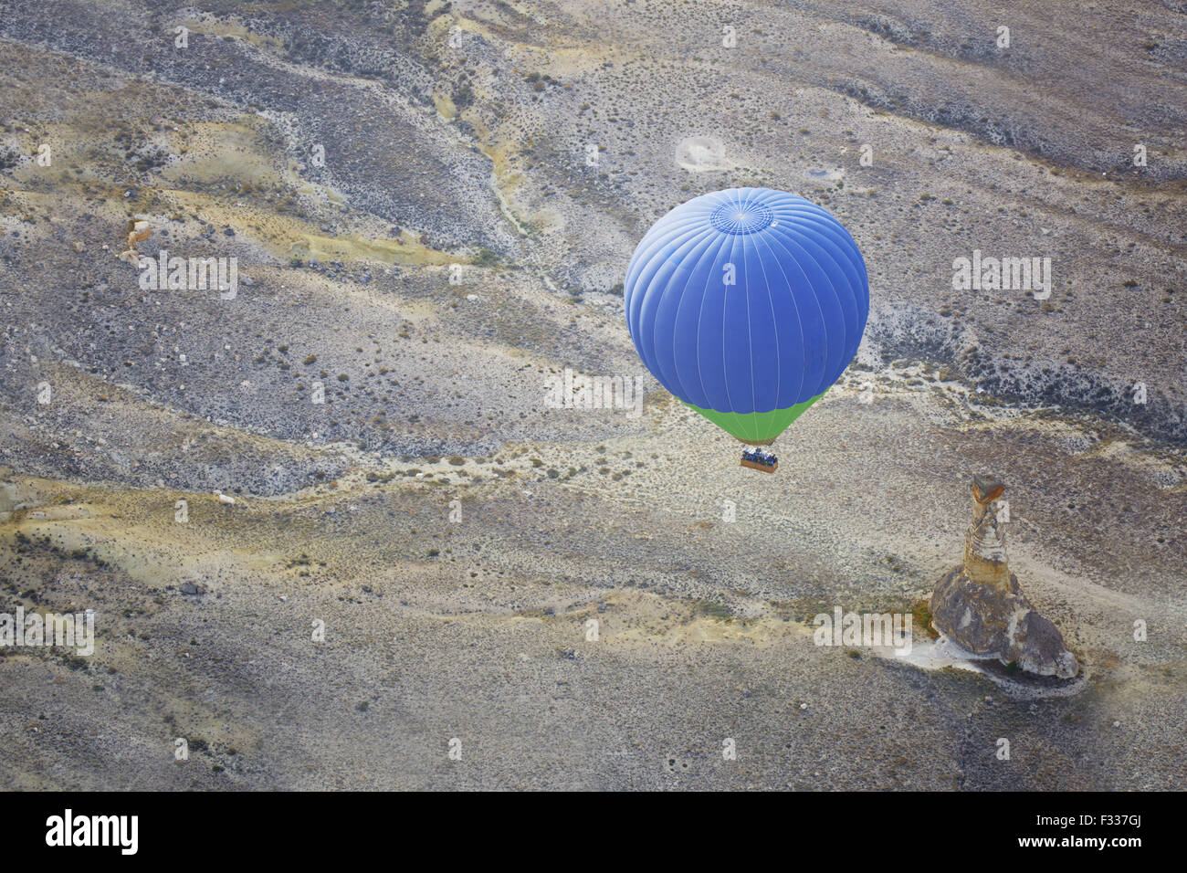 Air balloon flying above the land. Horizontal photo Stock Photo - Alamy