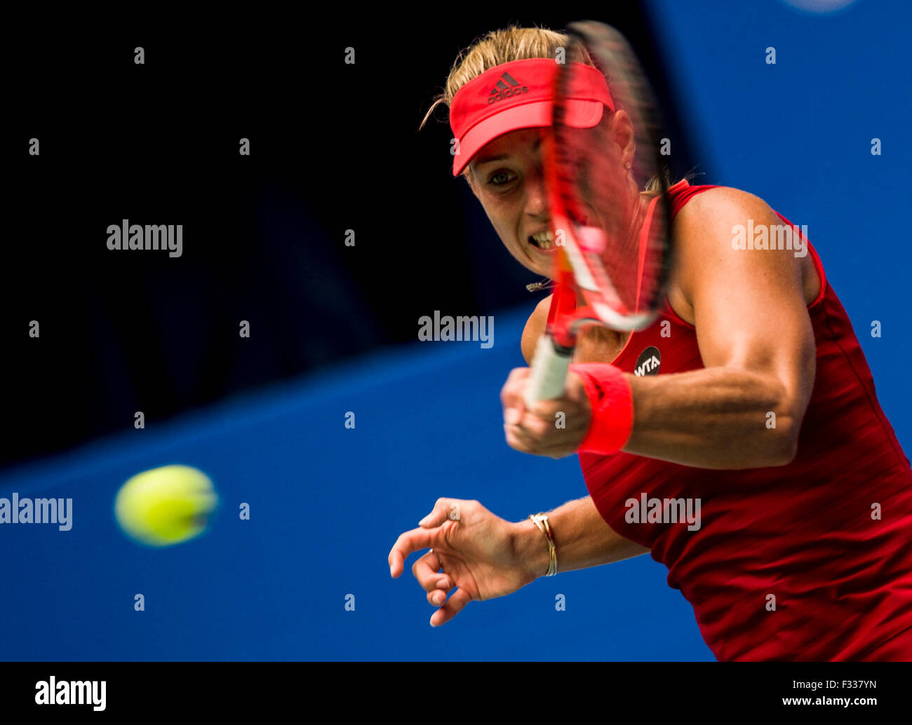 Whuhan, China. 29th Sep, 2015. Angelique Kerber of Germany returns the ...