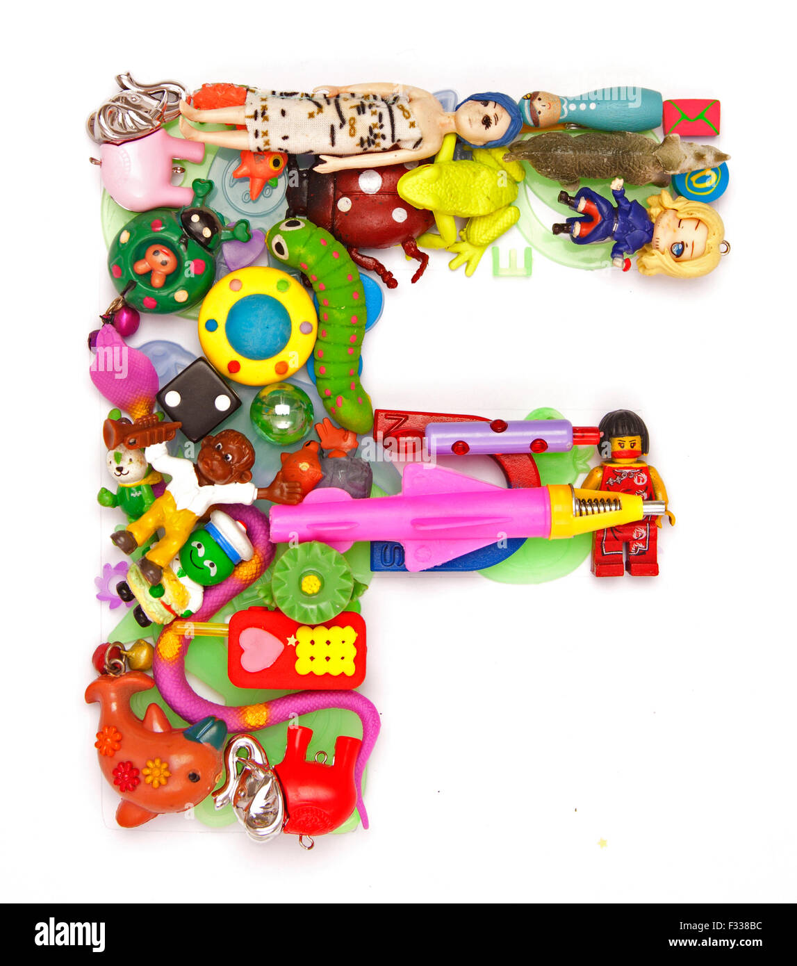 the letter F made from small toys Stock Photo - Alamy