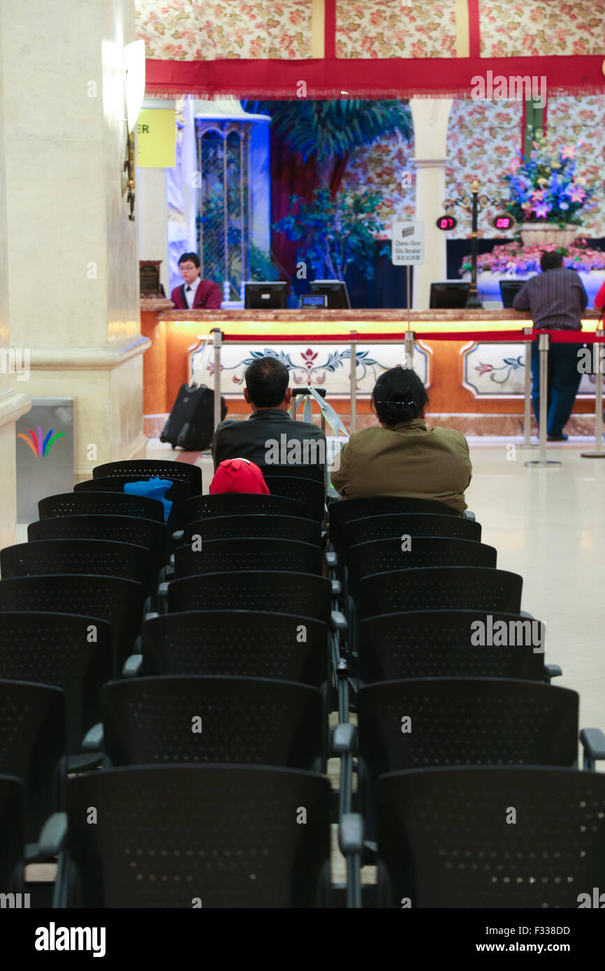 Family waiting at the reception lobby of First World Hotel, Genting ...