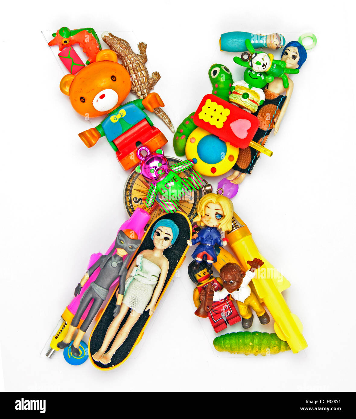 the letter X made from small toys Stock Photo - Alamy