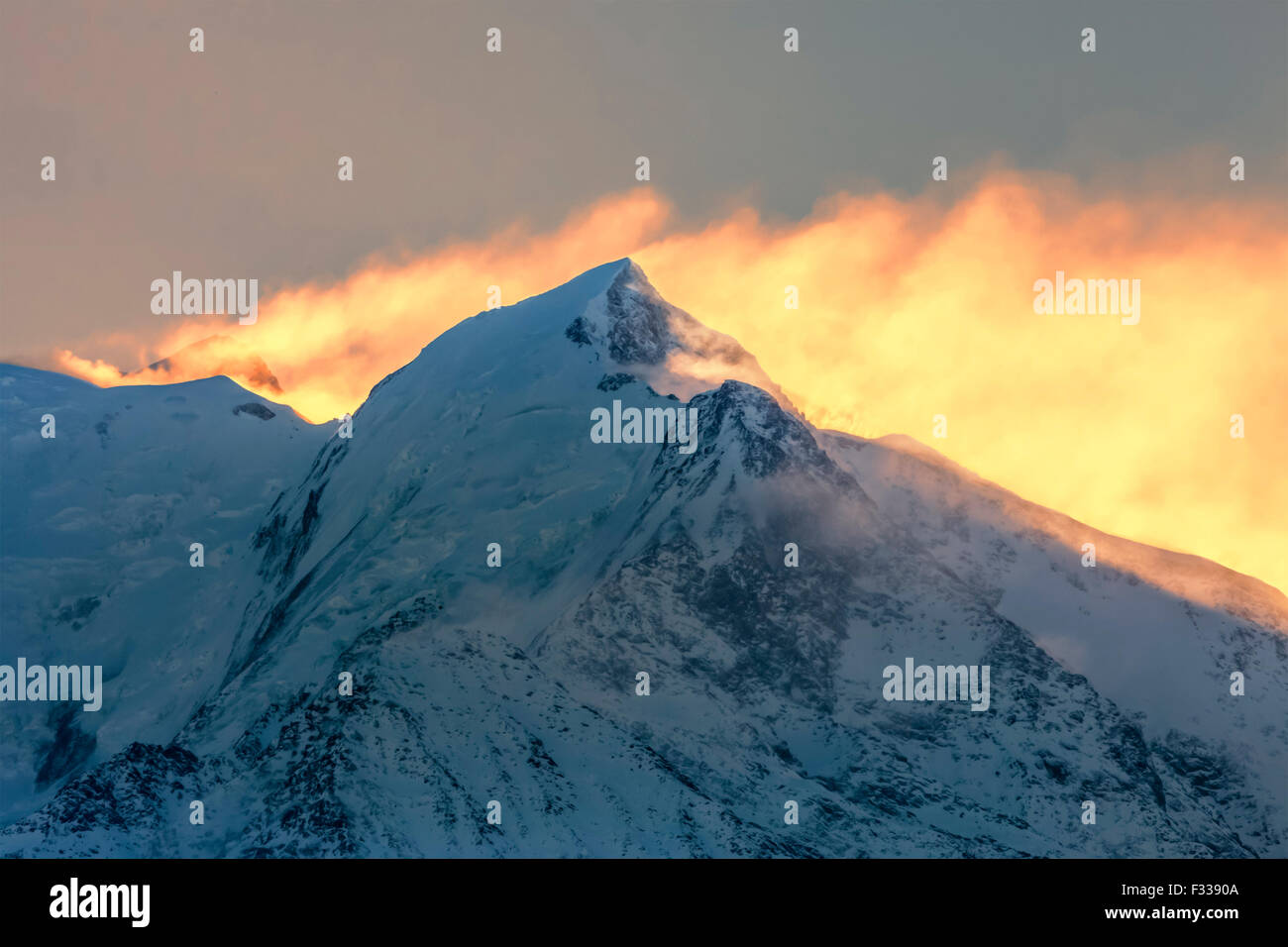 Backlit image at the sunrise on Mont Blanc - the highest mountain peak ...
