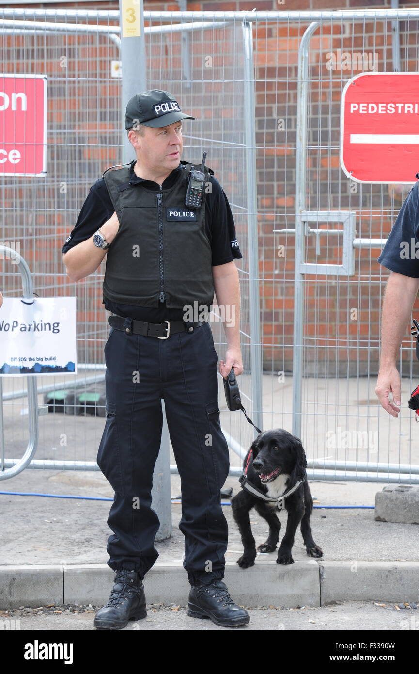 A Greater Manchester Police Dog Handler with his search dog Stock Photo ...