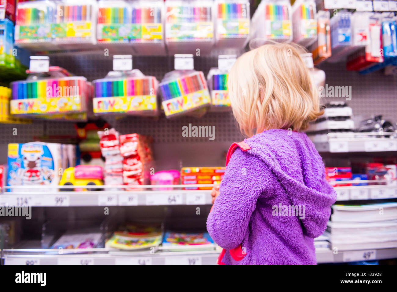 shopping for school supplies in a supermarket, educational stationery ...