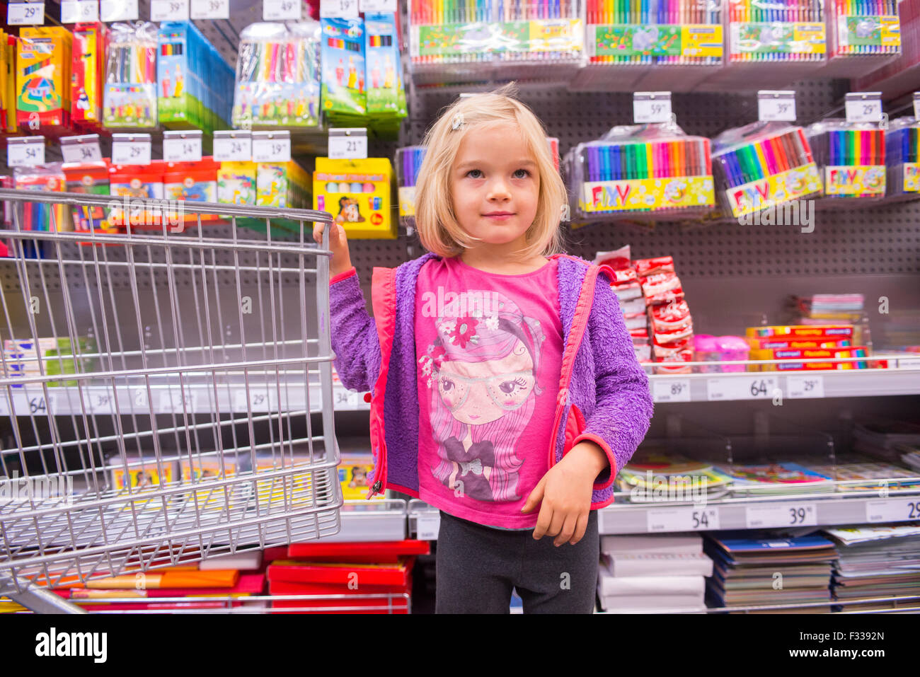 shopping for school supplies in a supermarket, educational stationery ...