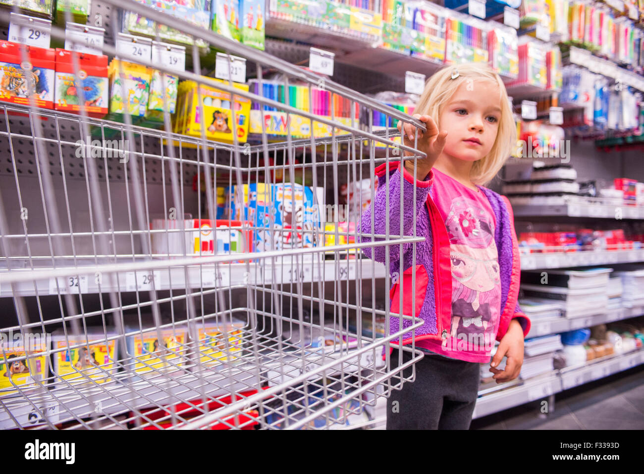 shopping for school supplies in a supermarket, educational stationery ...