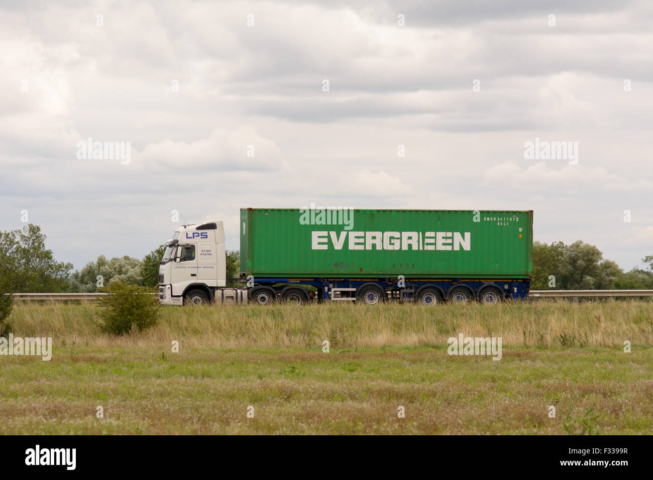 Articulated lorry transporting haulage for Evergreen Marine ...