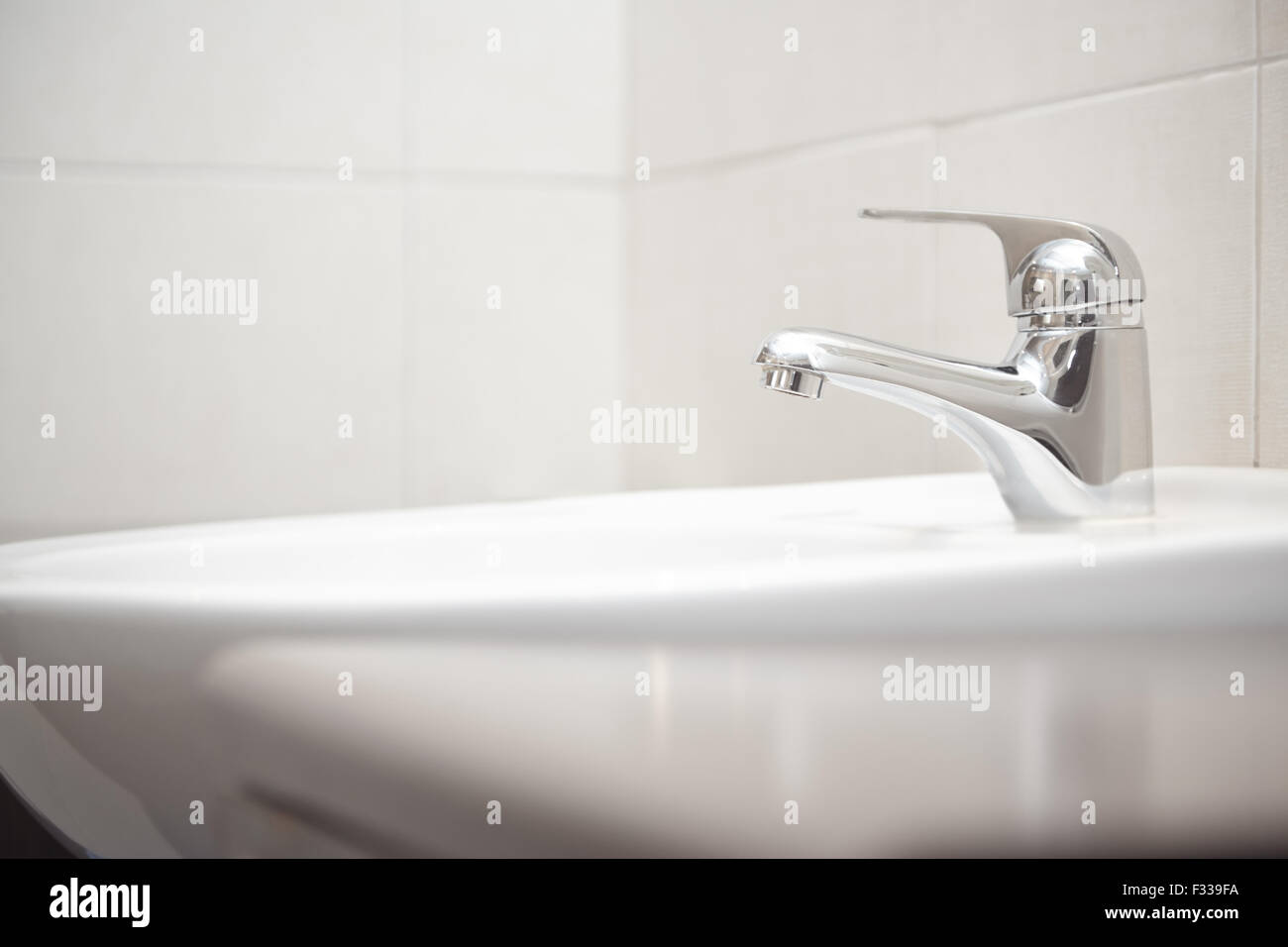 Sink with water tap. Close-up horizontal photo Stock Photo - Alamy