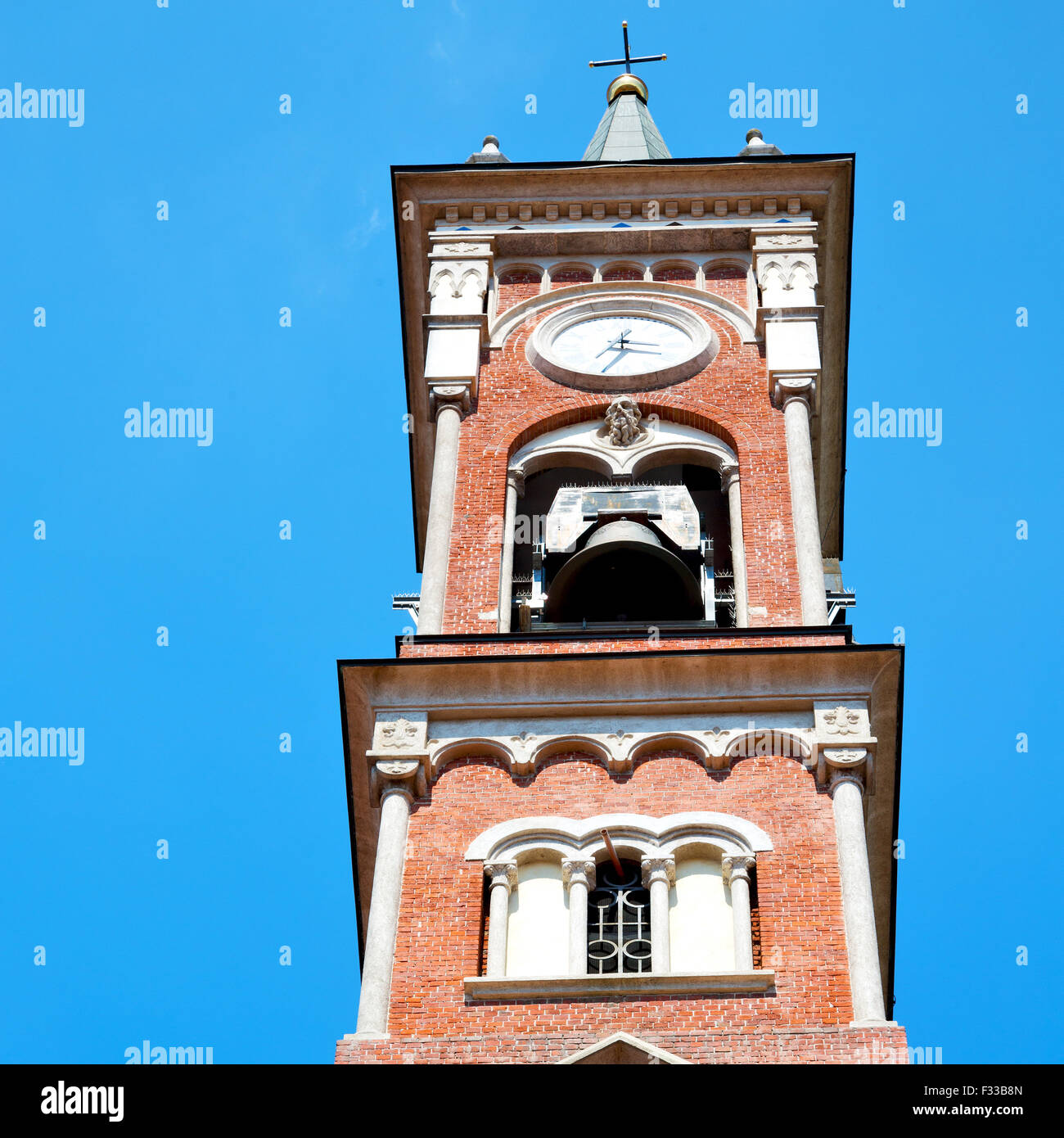 ancien clock tower in italy europe old stone and bell Stock Photo - Alamy