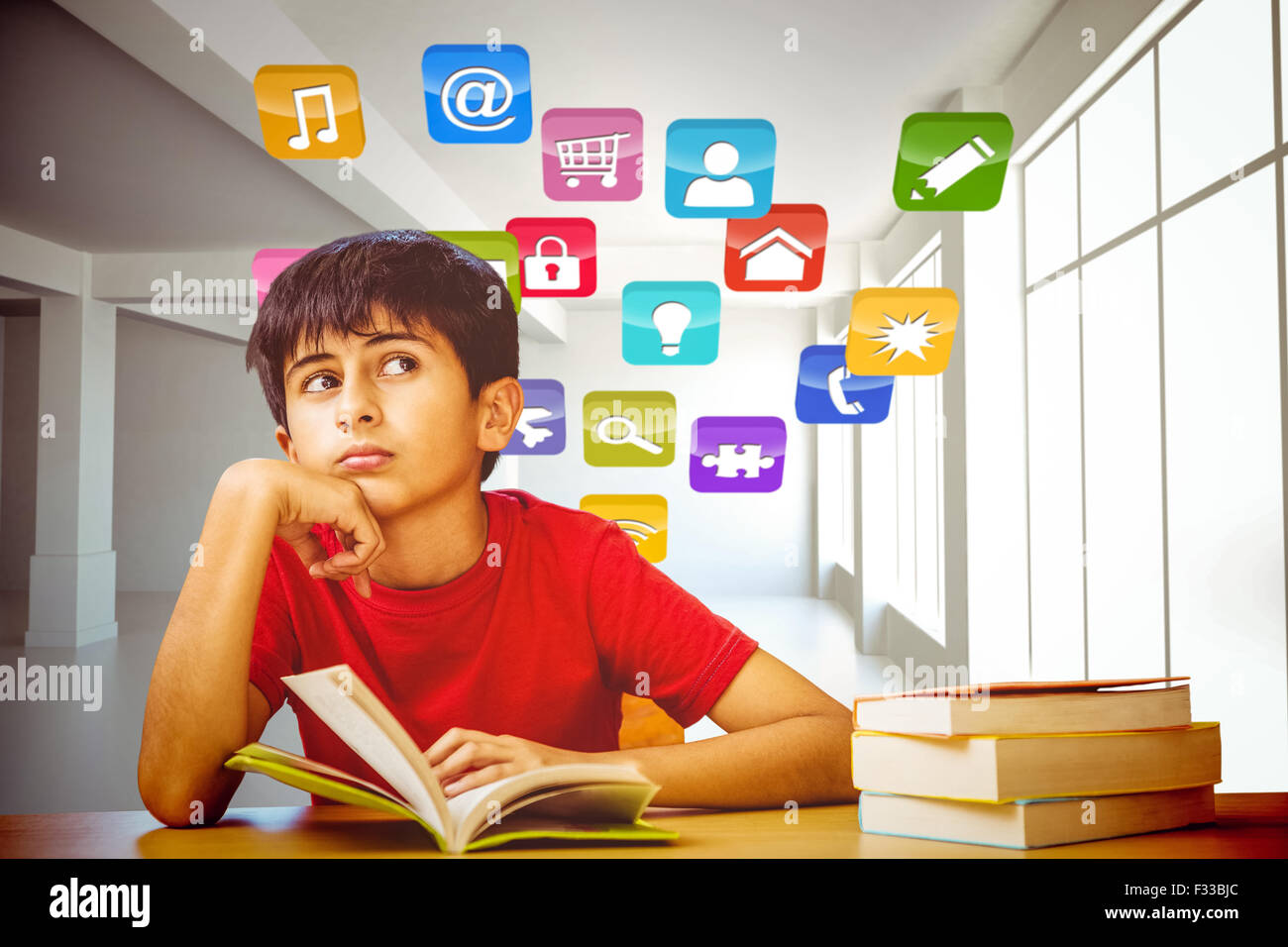 Hispanic boy reading book hi-res stock photography and images - Alamy