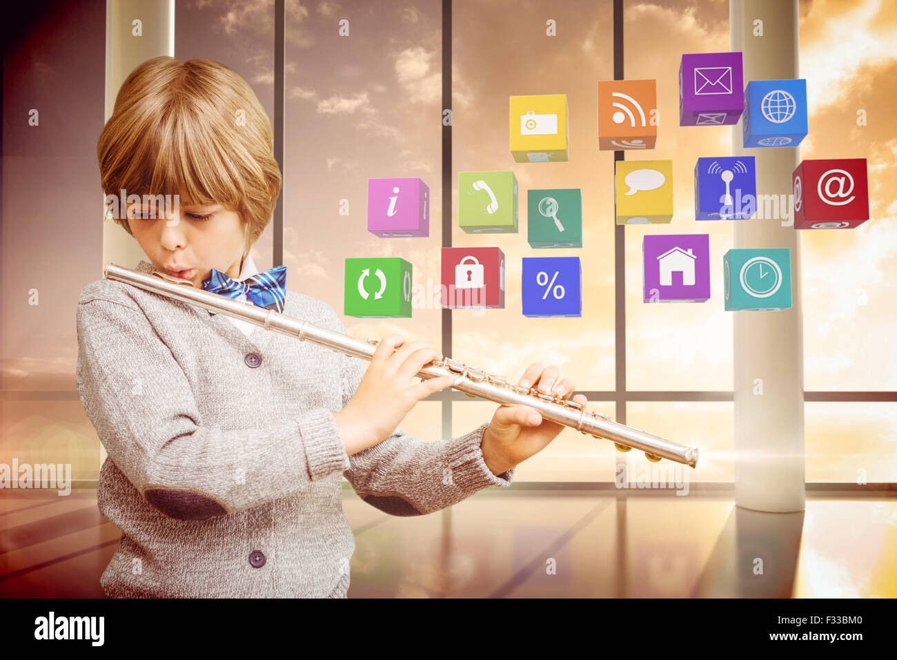 Composite image of cute pupil playing flute Stock Photo - Alamy
