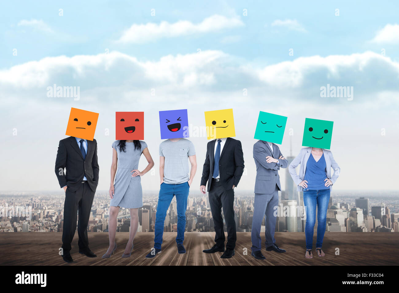 Composite image of people with boxes on their heads Stock Photo - Alamy