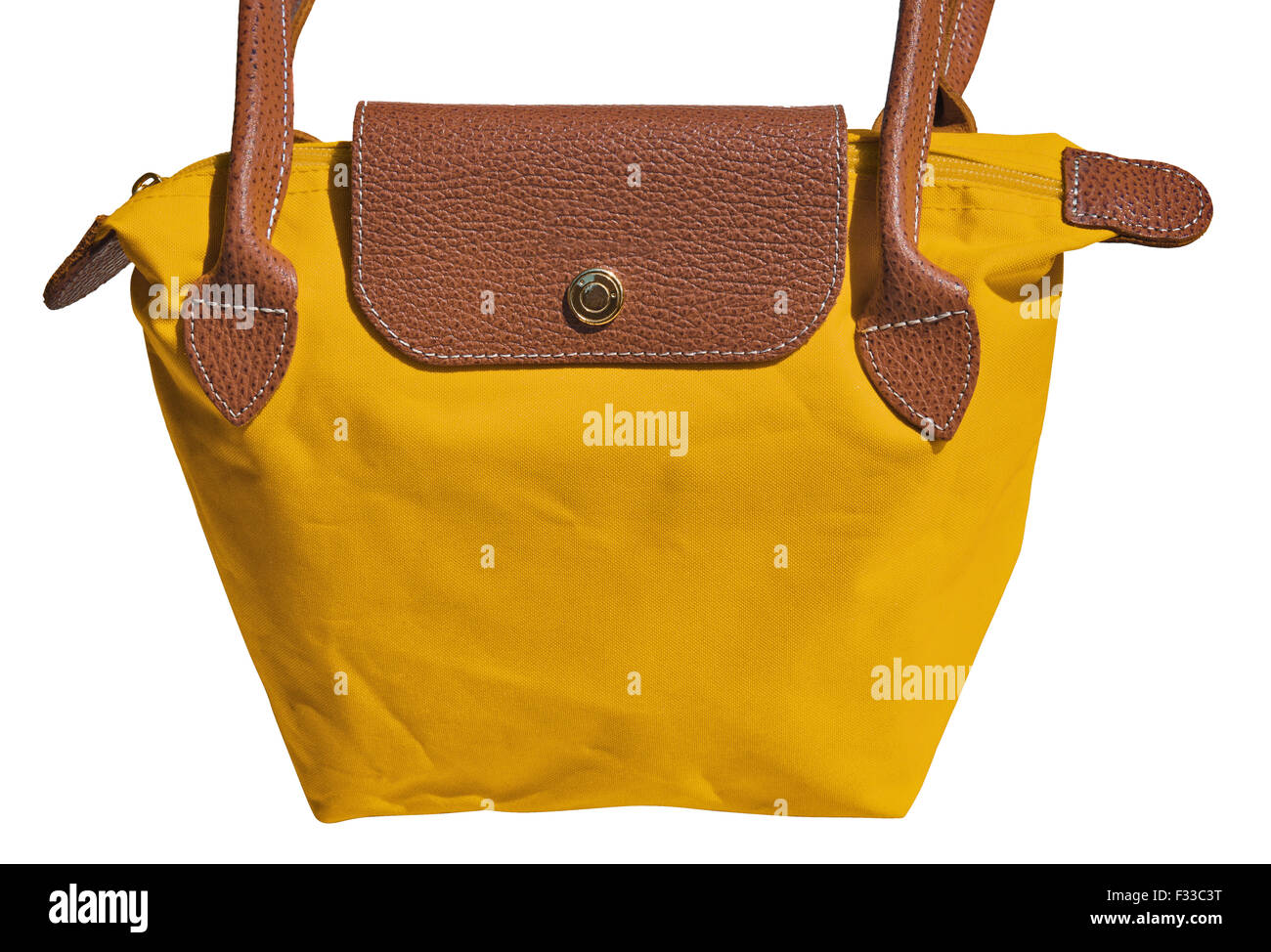 Yellow ladies handbag Stock Photo - Alamy