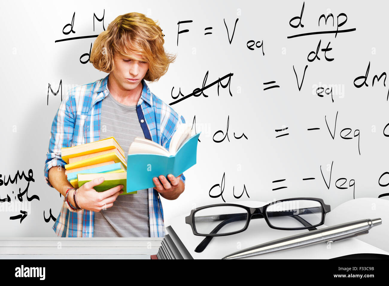 Composite image of student reading Stock Photo - Alamy