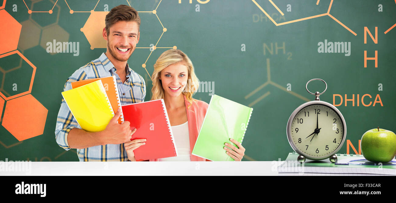 Composite image of happy students smiling at camera Stock Photo - Alamy